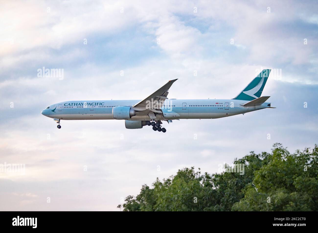 Cathay Pacific Boeing 777 aircraft as seen on final approach flying and ...