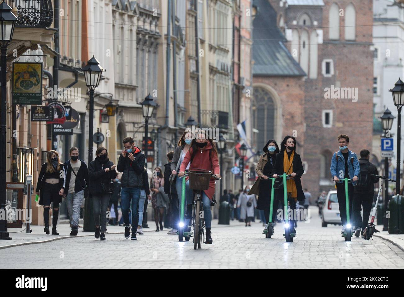 People wearing protective face masks seen in Krakow's center. Polish ...