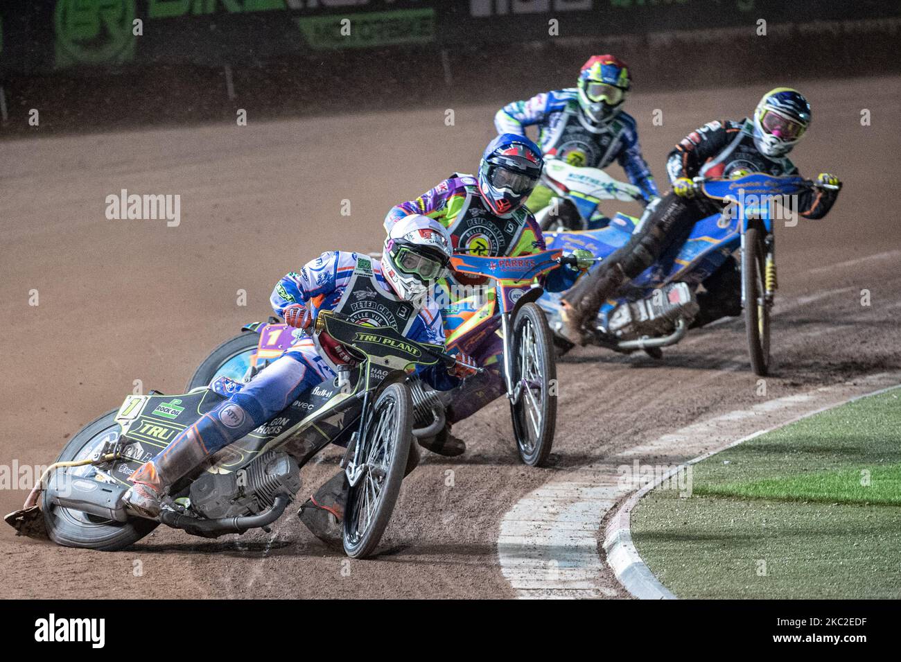 Jason Crump (White) leads Rory Schlein (Blue) Kyle Howarth (Yellow) and ...