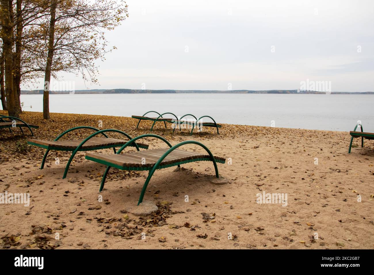 Empty sun loungers on the beach close up Stock Photo - Alamy