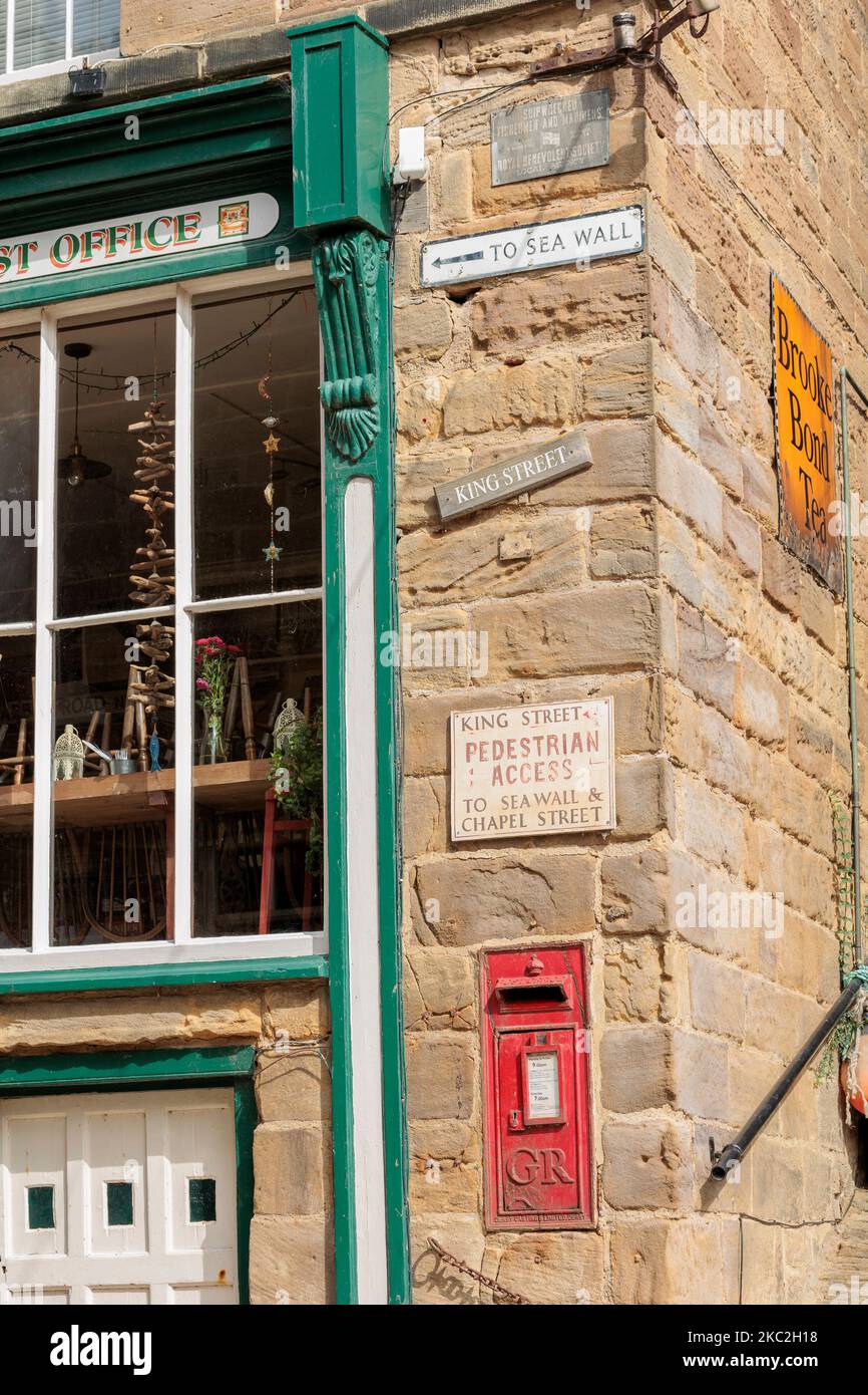 Character signs on the wall King Street Robin Hood Bay North Yorkshire ...
