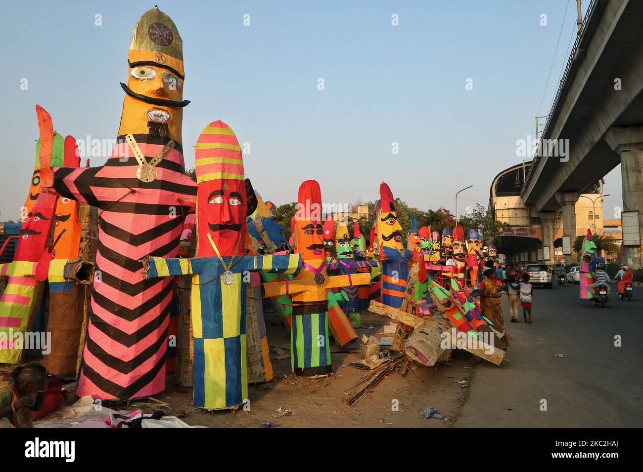 Effigies of the demon king Ravana put on display for sale at roadside ...