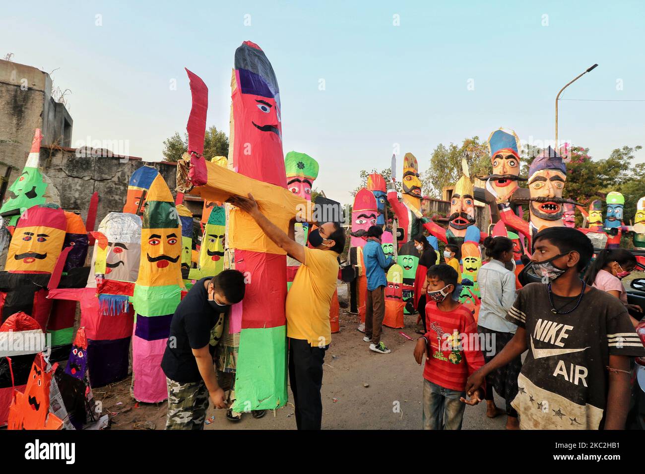 Effigies of the demon king Ravana put on display for sale at roadside ...
