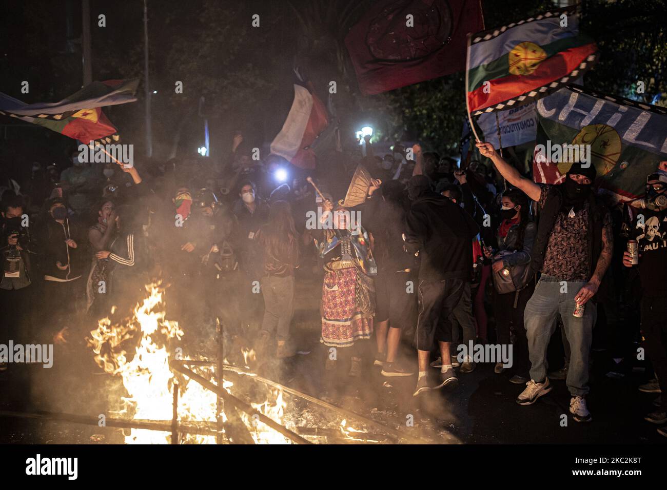 People gather to celebrate the victory of the referendum, in Santiago ...