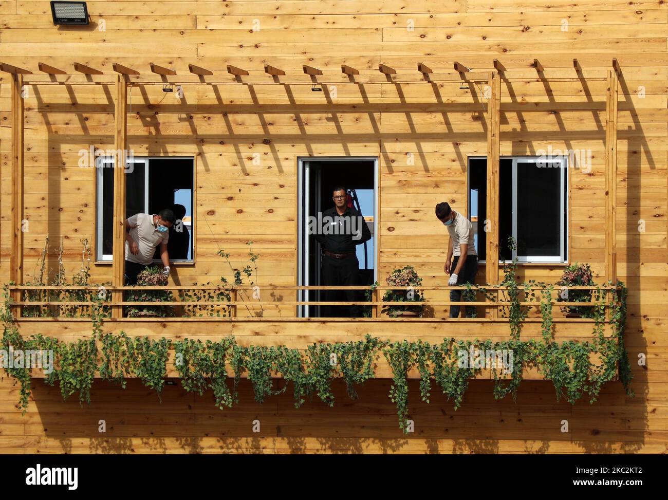 Palestinian workers at a beach side cafe in Gaza City, October 26, 2020 ...