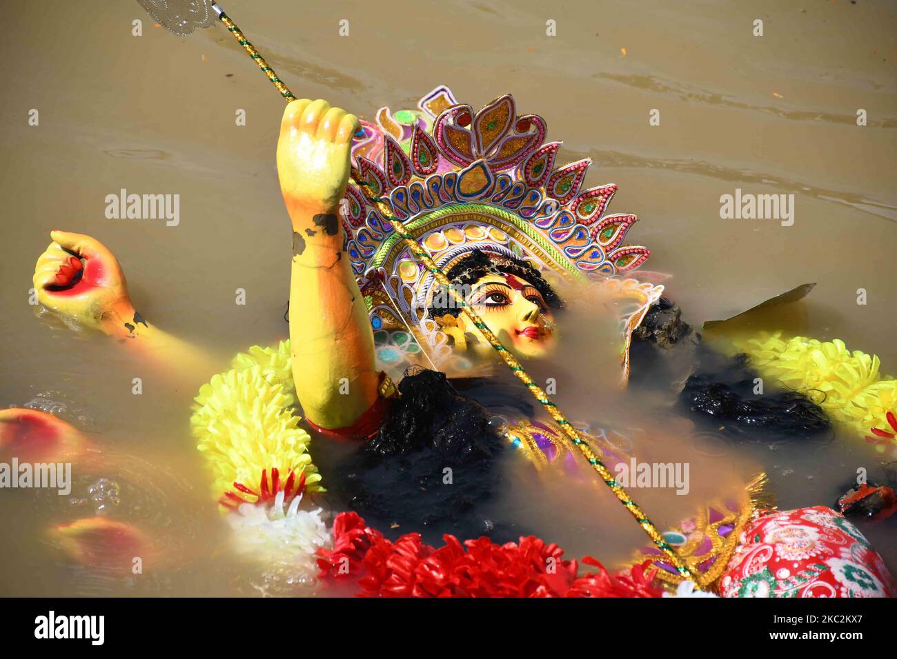 Hindu goddess Durga into the brahmaputra river during the immersion ...