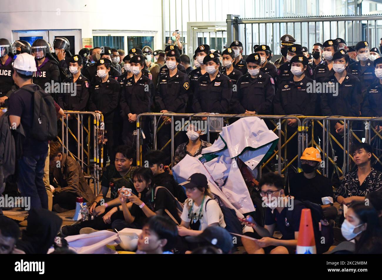 Women riot police stand guard during a rally outside German embassy in ...