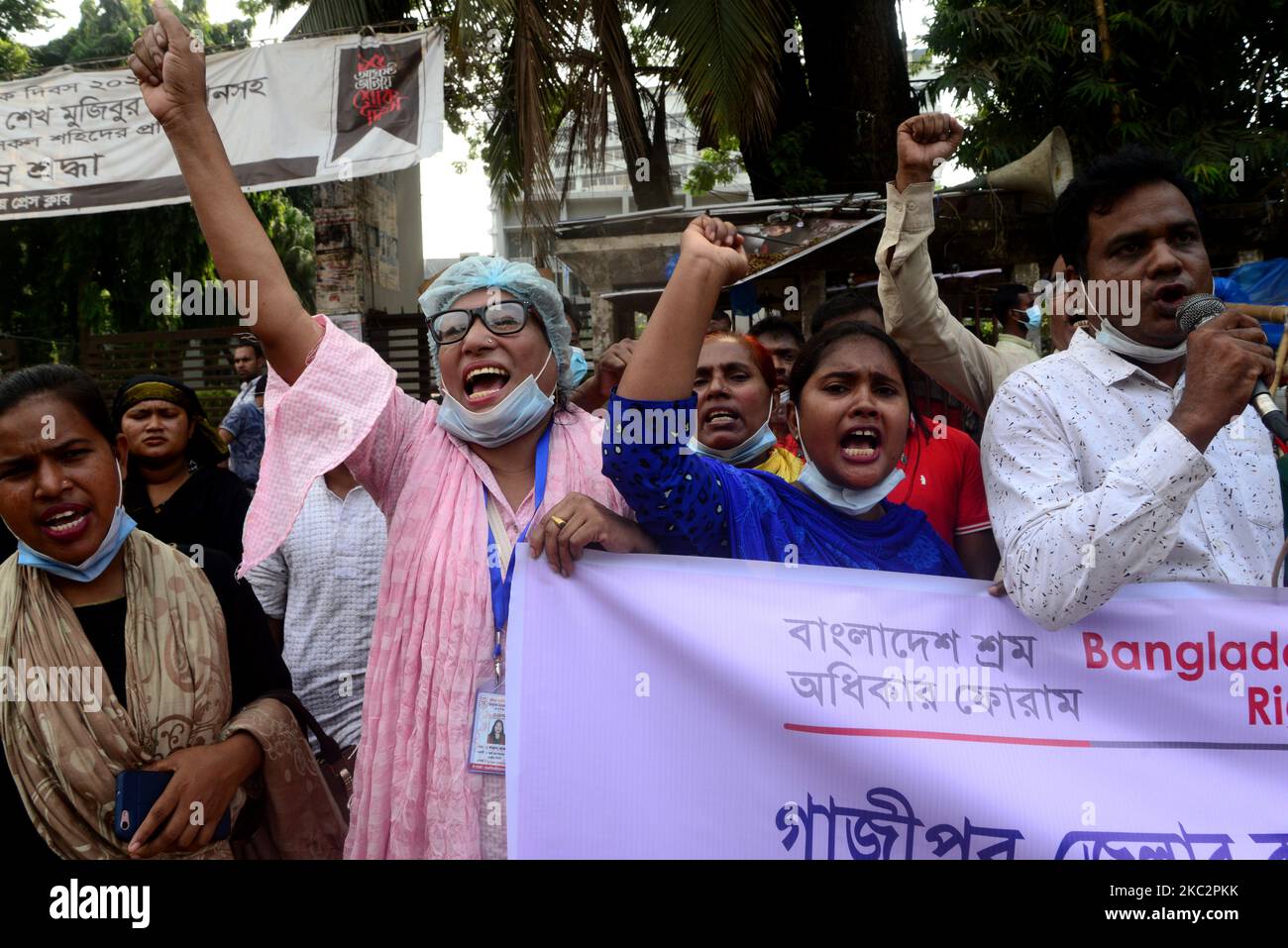 Bangladesh Labor Rights Forum held a protest rally demanding arrest and ...