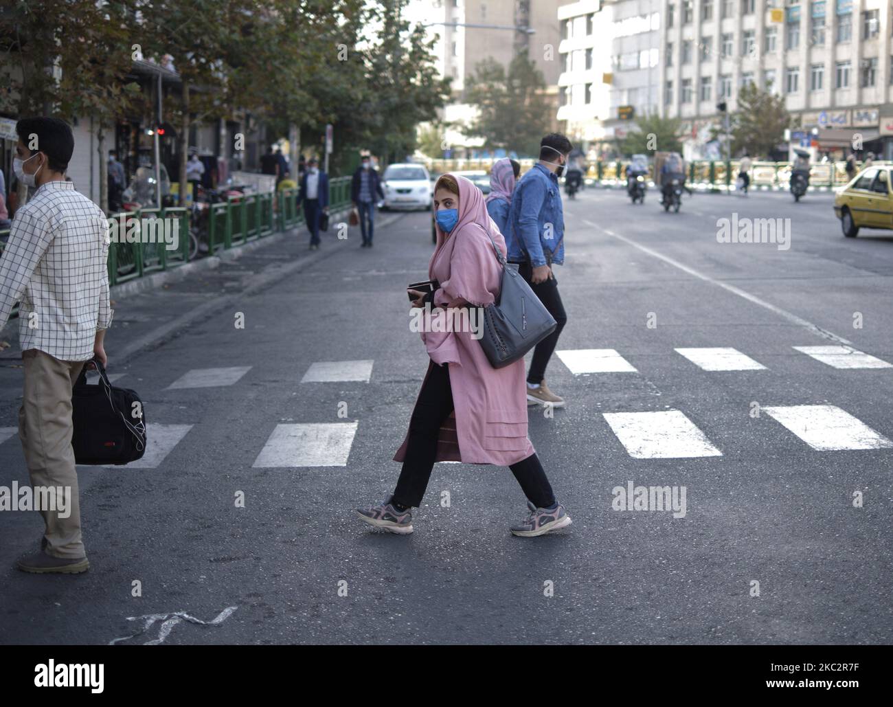 An Iranian woman wearing a protective face mask to prevent herself of ...