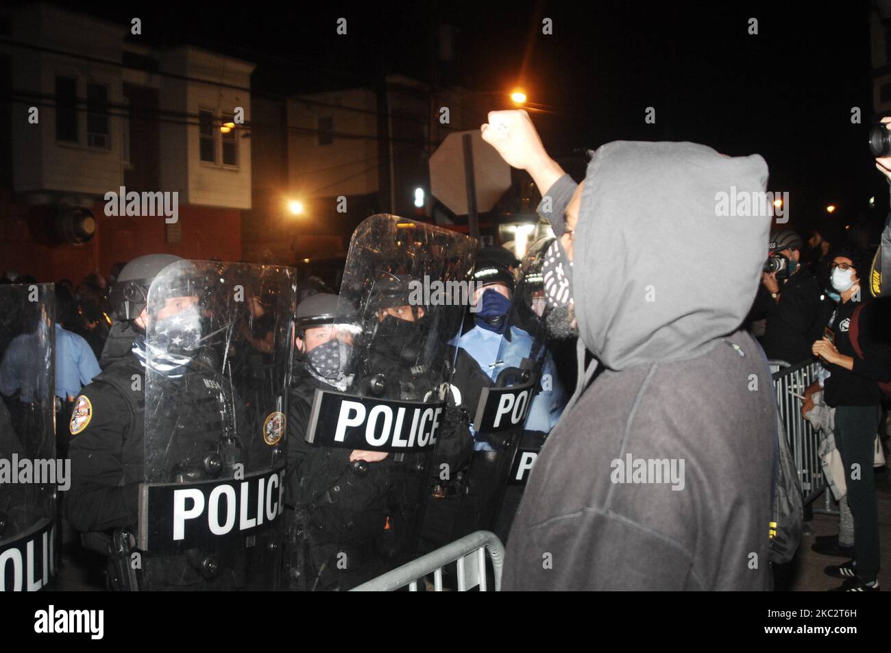 Protesters confront police outside of the 18th Police Precinct at 55th ...