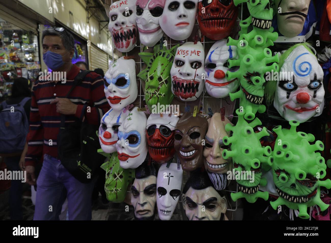Sale of costumes and masks of the coronavirus molecule in the corridors ...