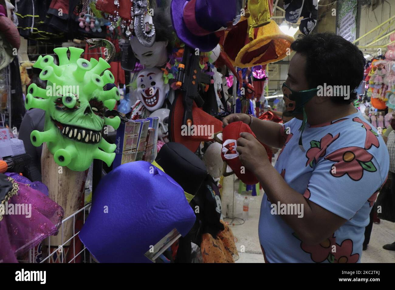 A person walks through the Sonora Market, Mexico City, in search of ...