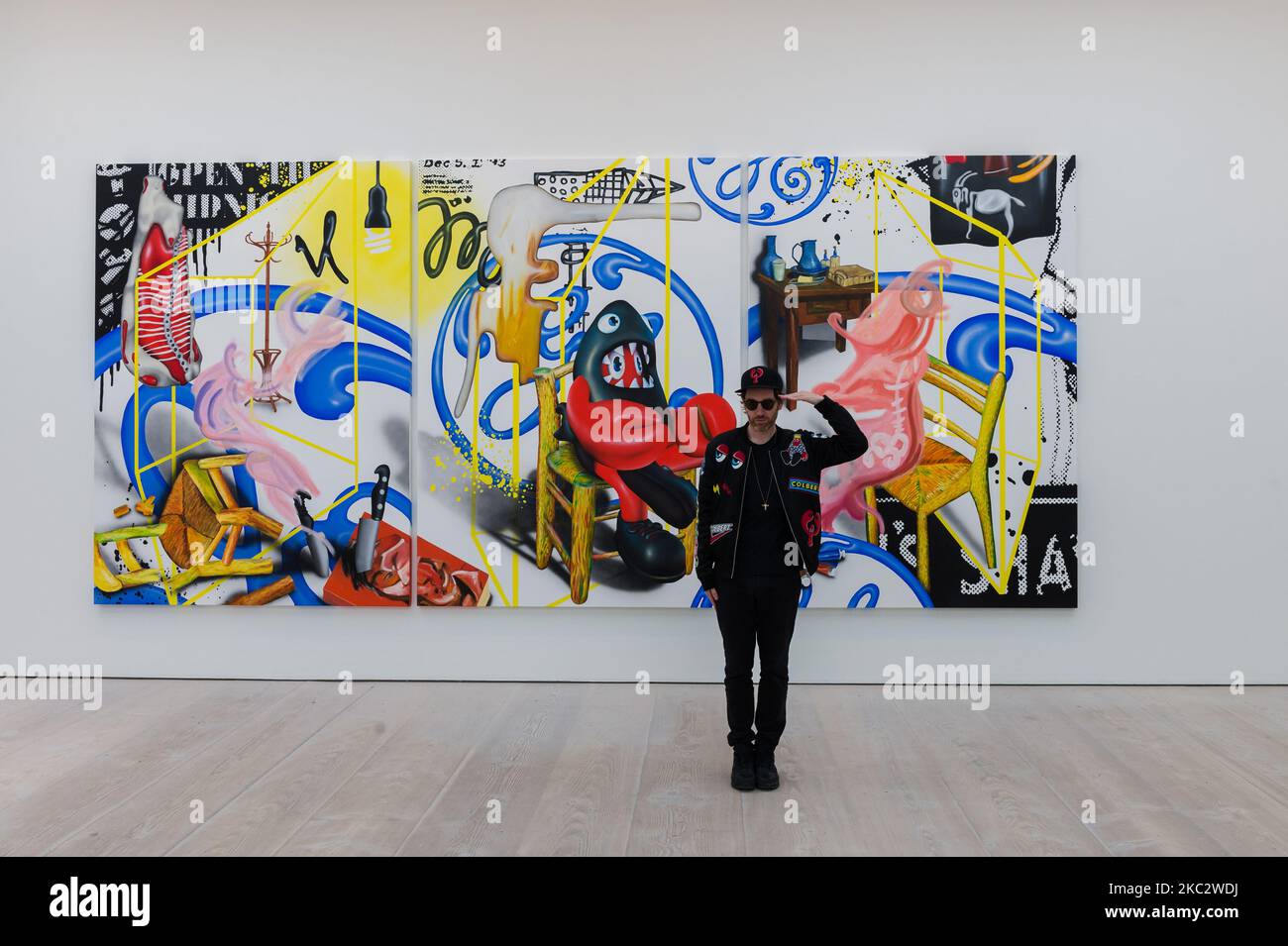 Pop artist Philip Colbert poses for photographers during the world’s ...