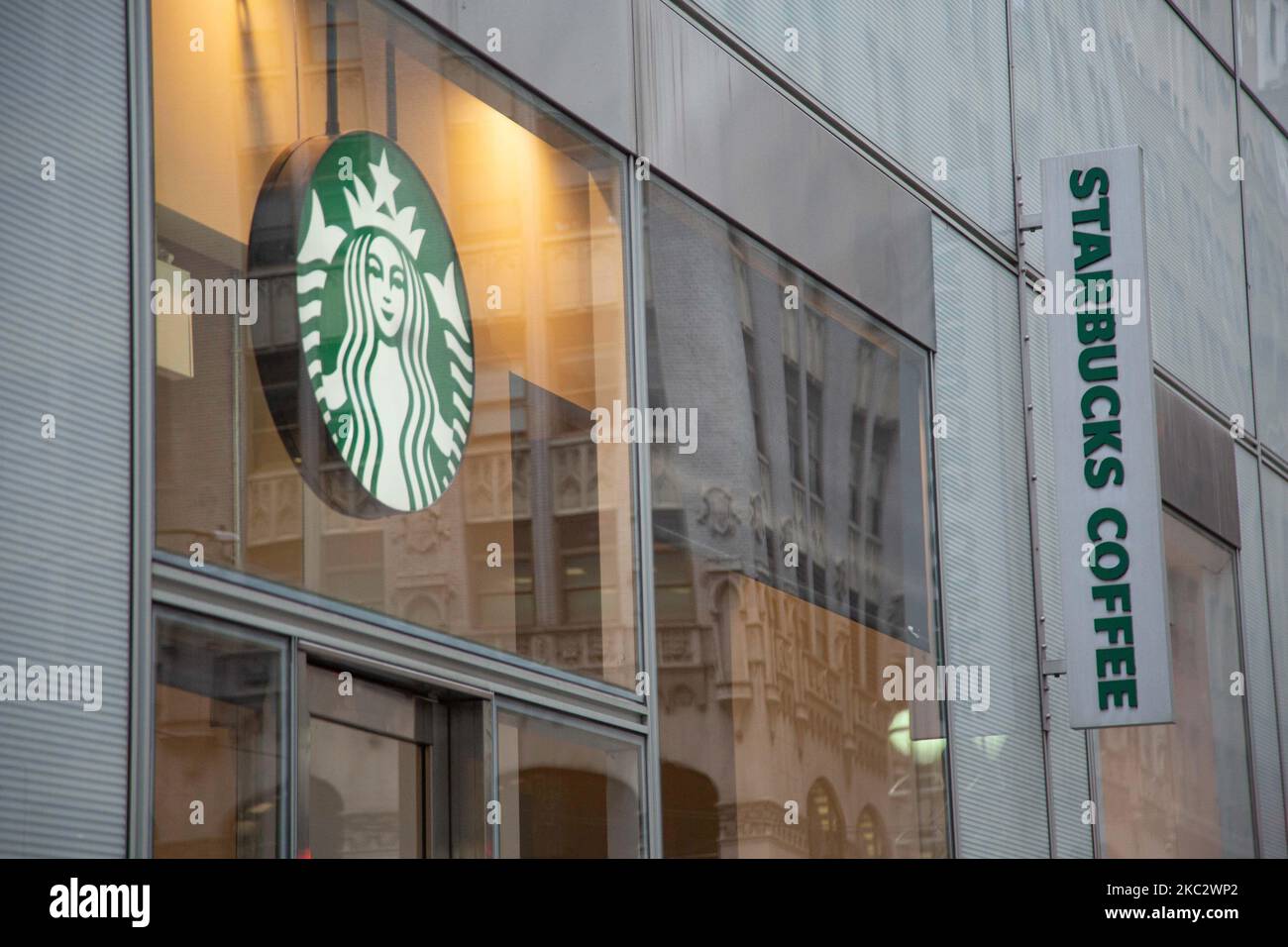 Closeup of a green Starbuck mermaid or siren from Greek mythology logo ...
