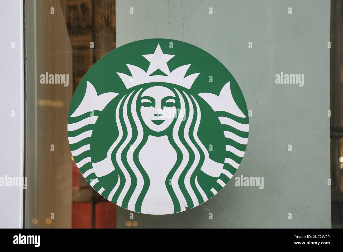 Closeup of a green Starbuck mermaid or siren from Greek mythology logo ...