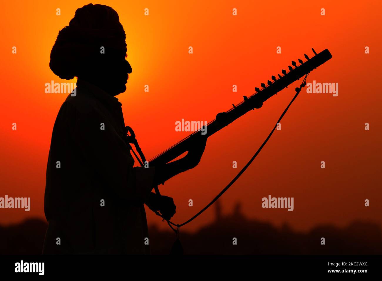 A Rajasthani Man Plays A ''Ravanahatha'' (traditional Stringed ...