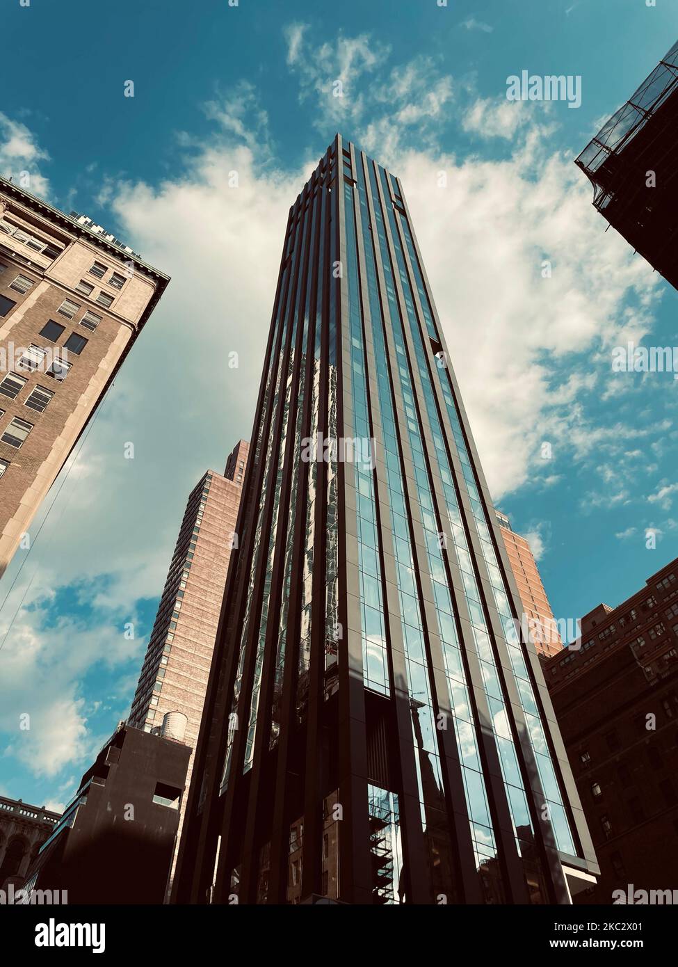 A low angle shot of high-rise buildings in NYC Stock Photo - Alamy