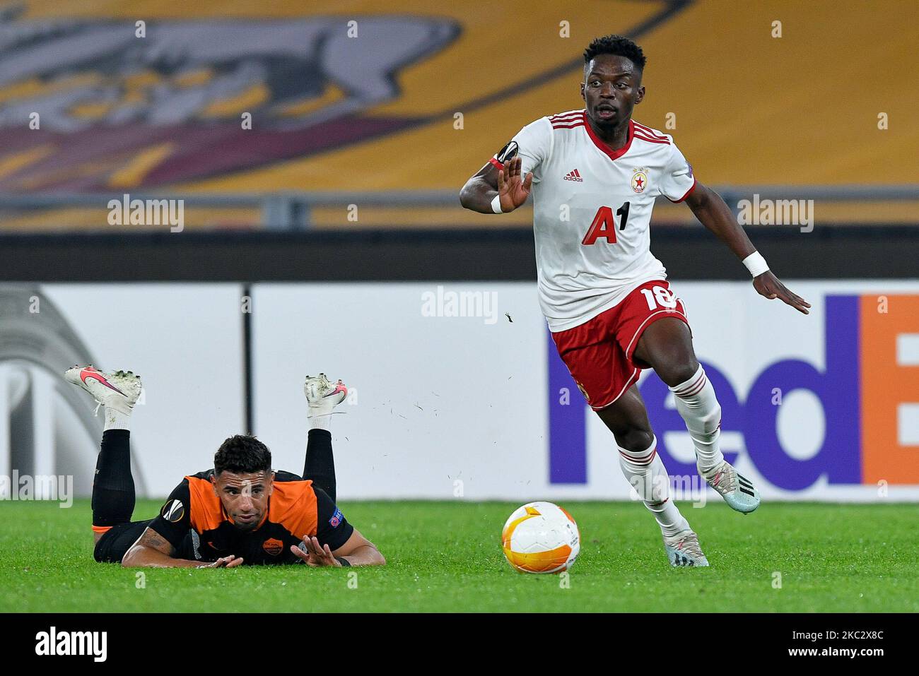 Bradley Mazikou of CSKA-Sofia and Bruno Peres of AS Roma compete for ...