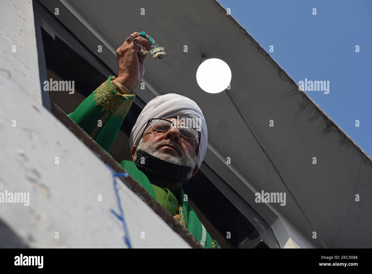 Head cleric displaying holy relic on the occasion of celebration of ...
