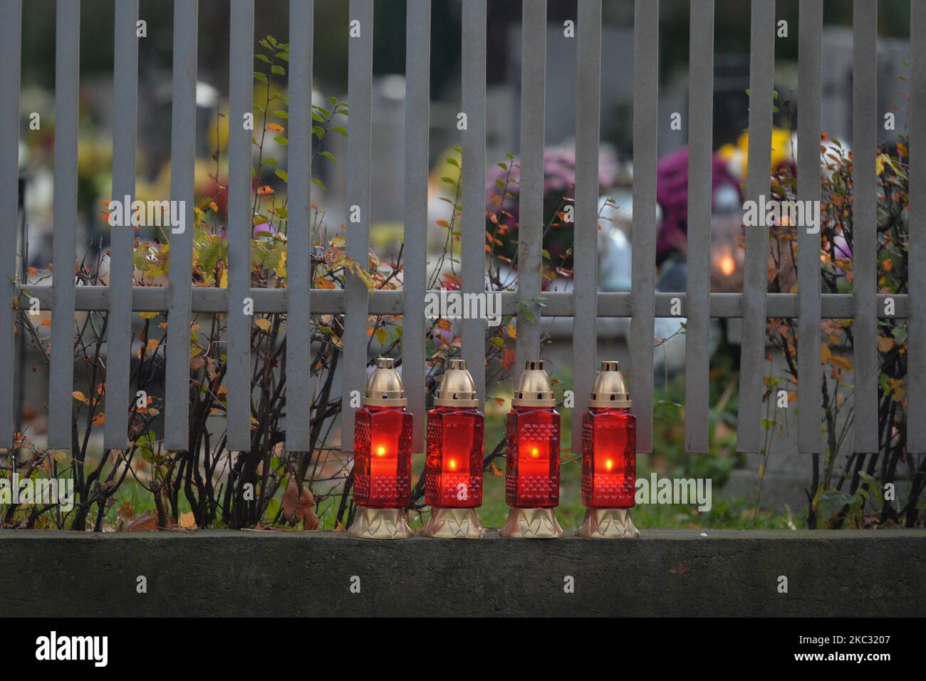Chrysanthemum flowers grave candles hi-res stock photography and images ...