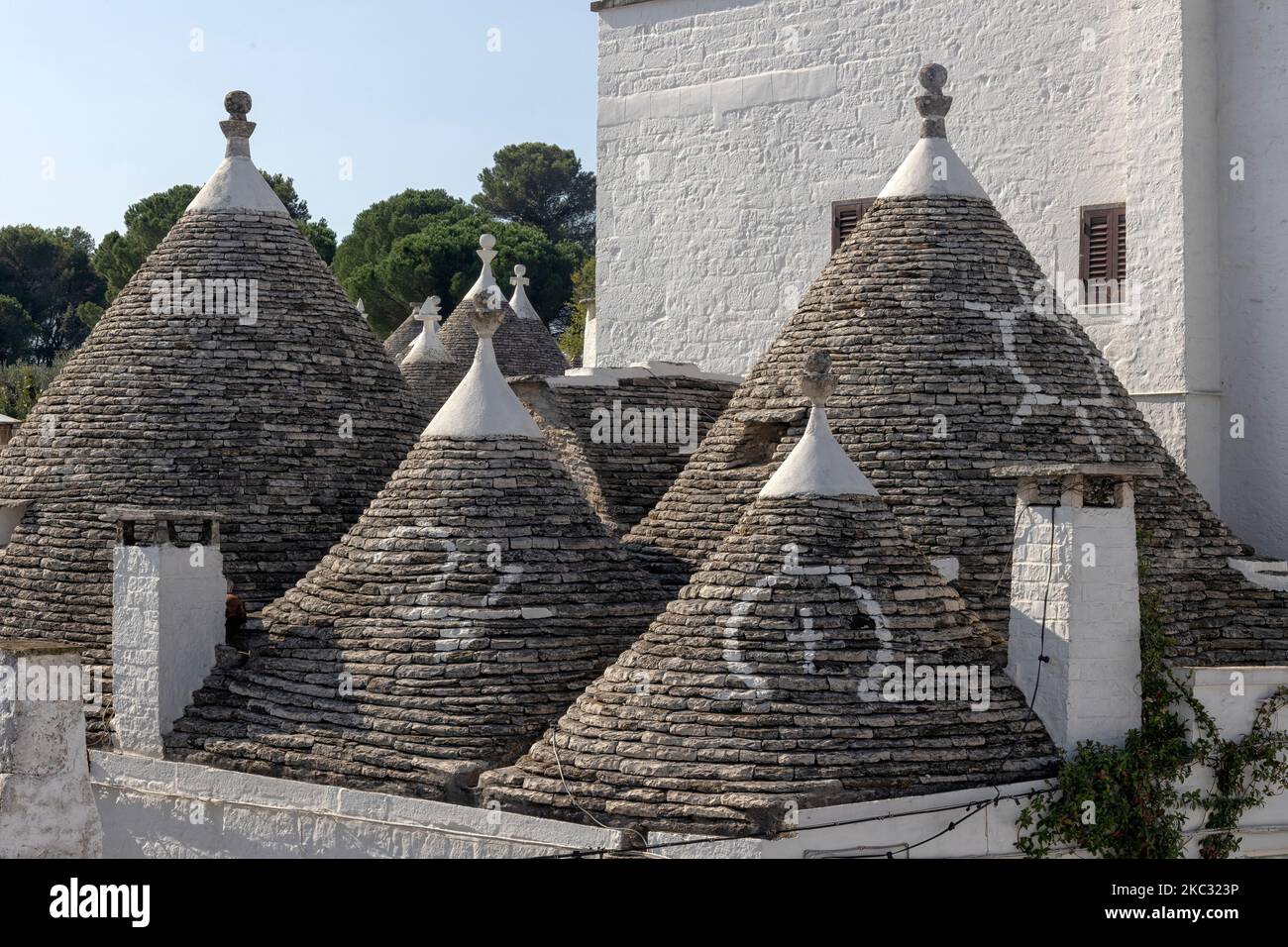 ALBEROBELLO, ITALY - OCTOBER 15, 2022: Close up of roofs of traditional ...