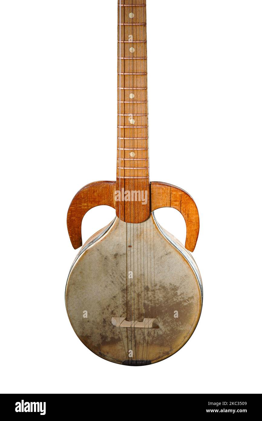 An ancient Asian stringed musical instrument on a white background ...