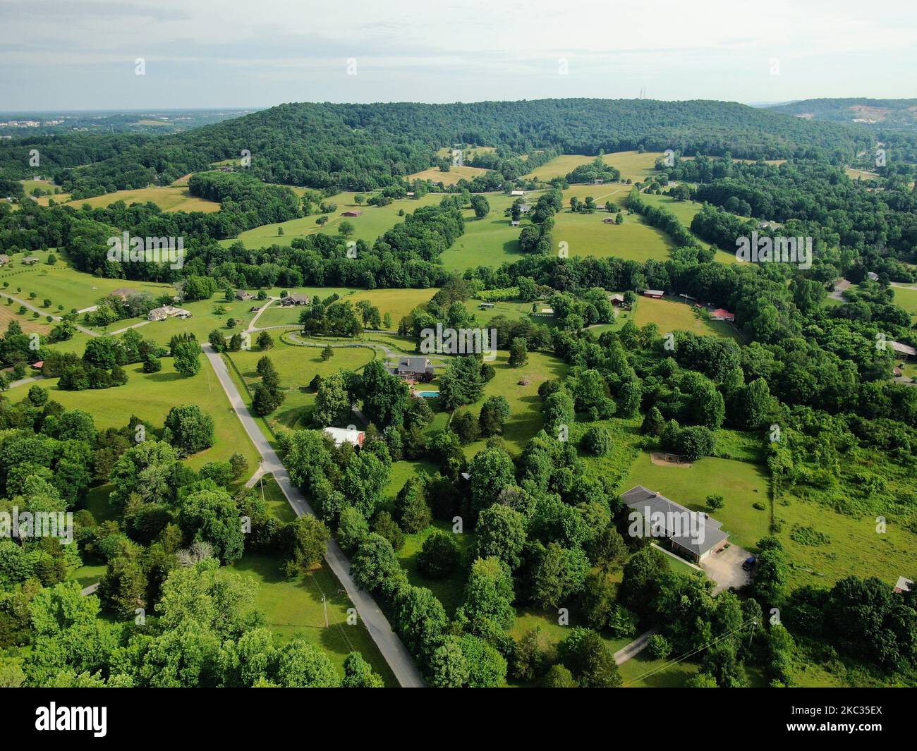 An aerial of a green countryside area Stock Photo - Alamy