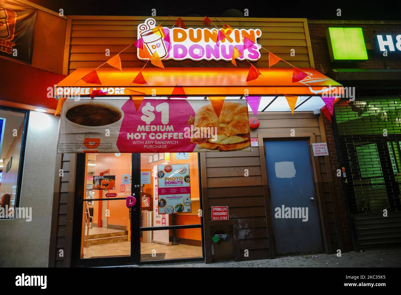 Dunkin' Donuts sign at their Woodside, Queens. Dunkin Donuts / Baskin ...