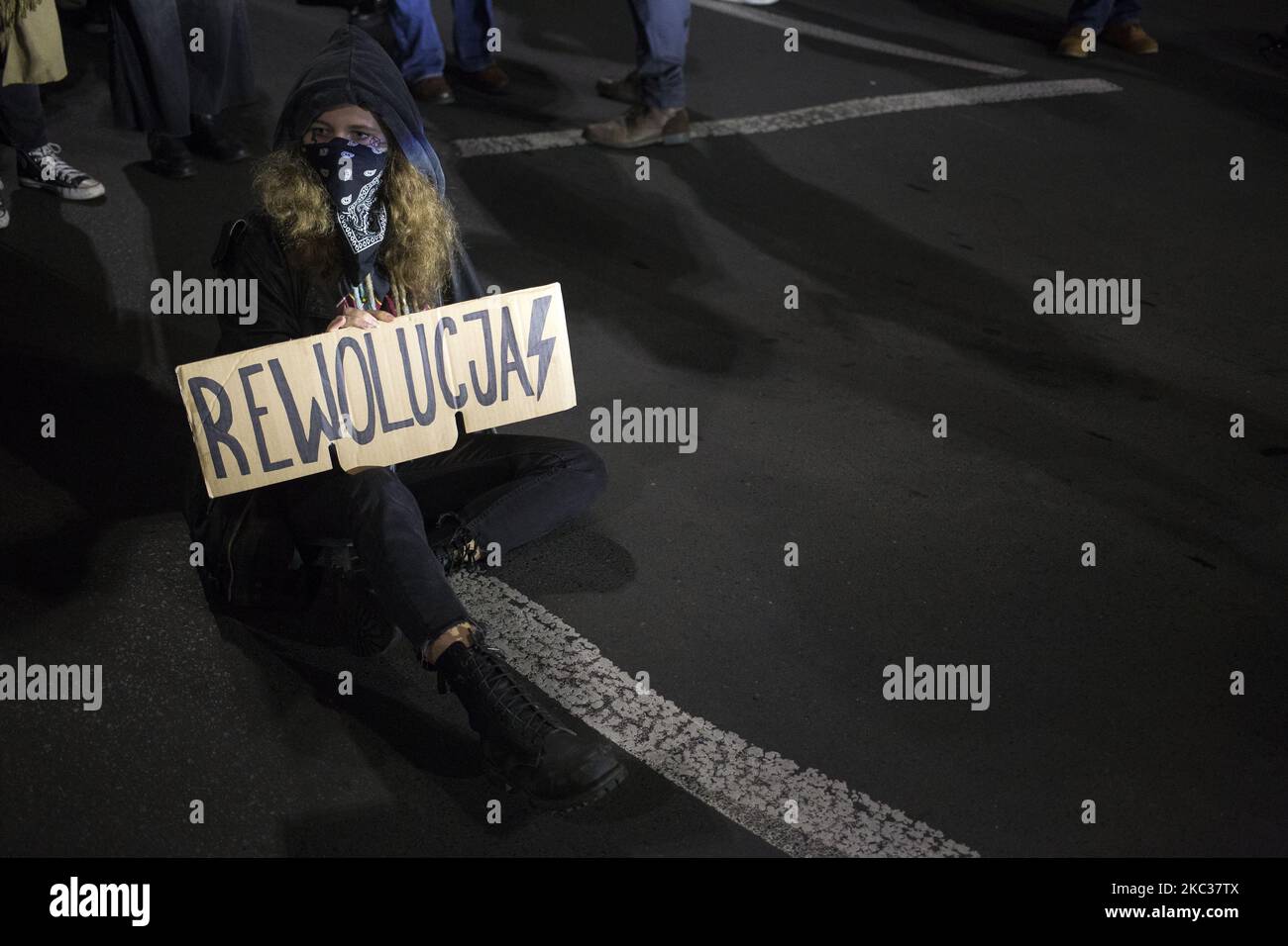 Woman holds Revolution banner during Second Blockade of Warsaw ...