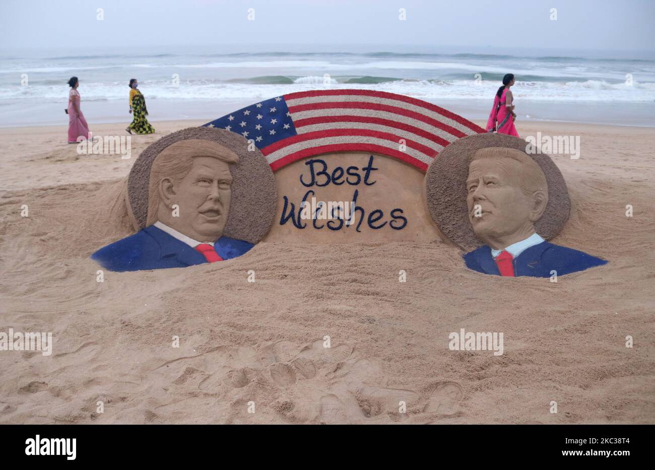 A sand sculpture of Donald Trump and Joe Biden is seen on November 3 ...