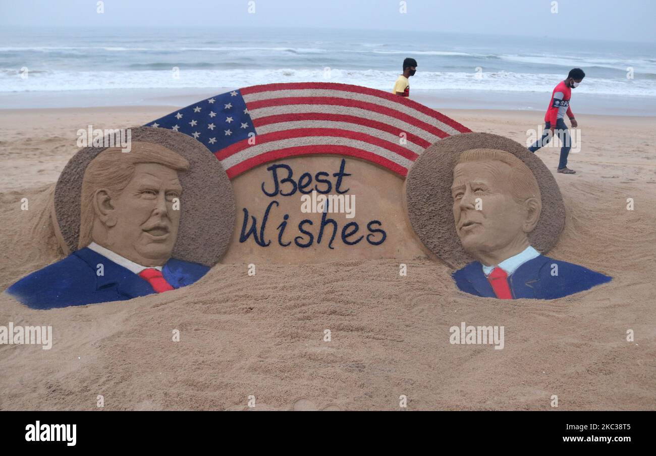 A sand sculpture of Donald Trump and Joe Biden is seen on November 3 ...