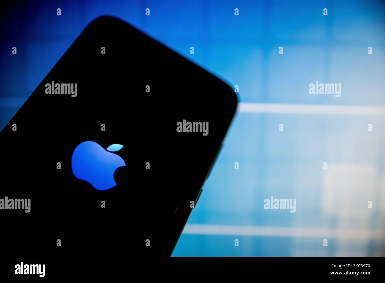 In this photo illustration Apple logo is displayed on a smartphone ...