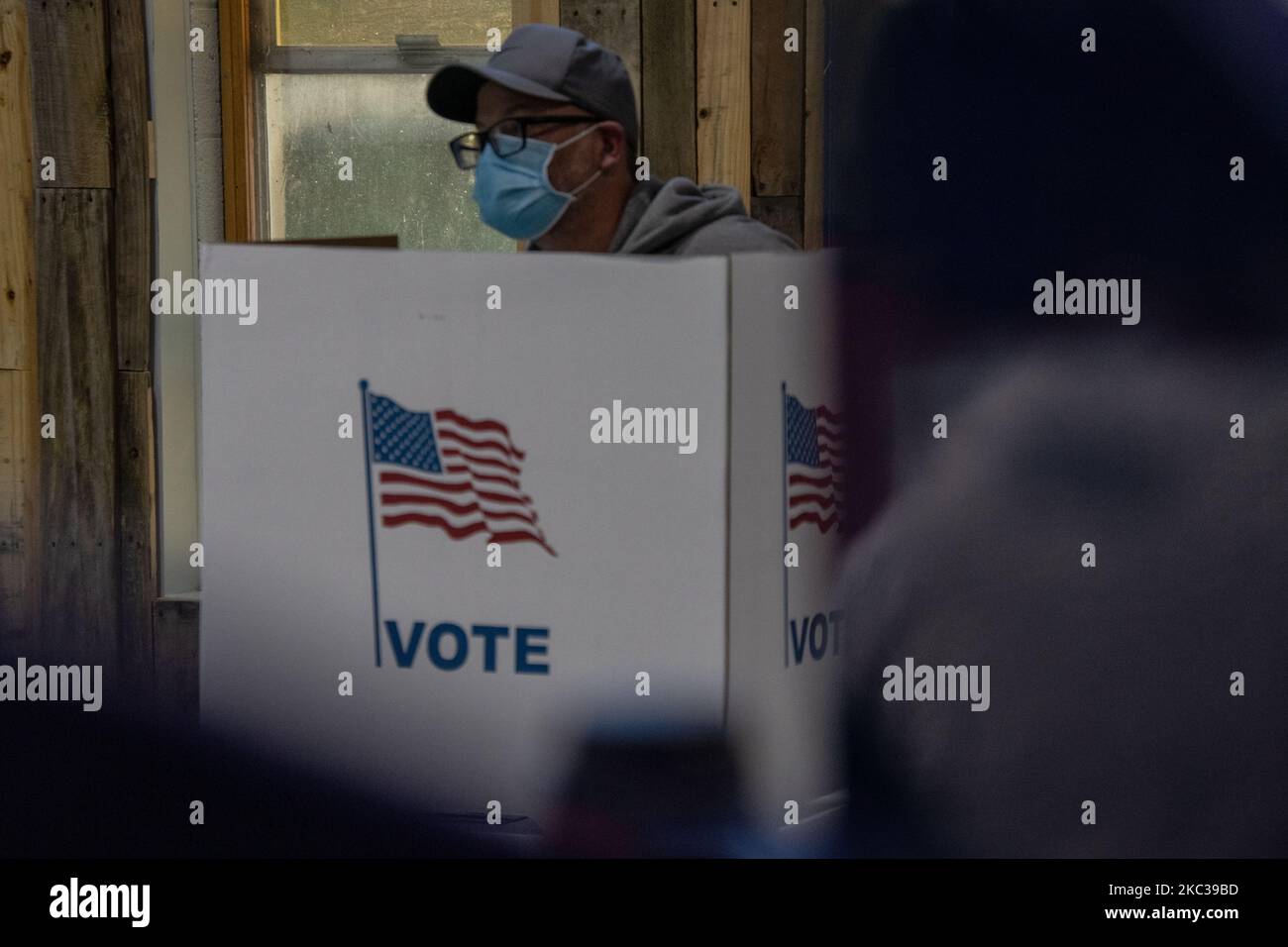 American voters cast their ballots in the Metro Detroit suburb, Royal ...