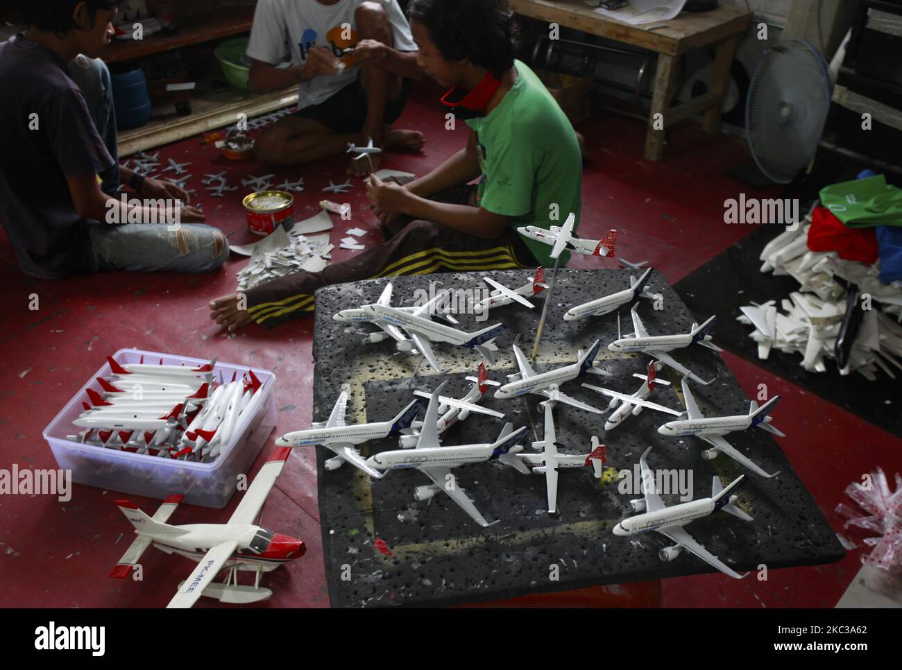 Workers work on making aircraft miniatures Airbus A320neo at workshop ...