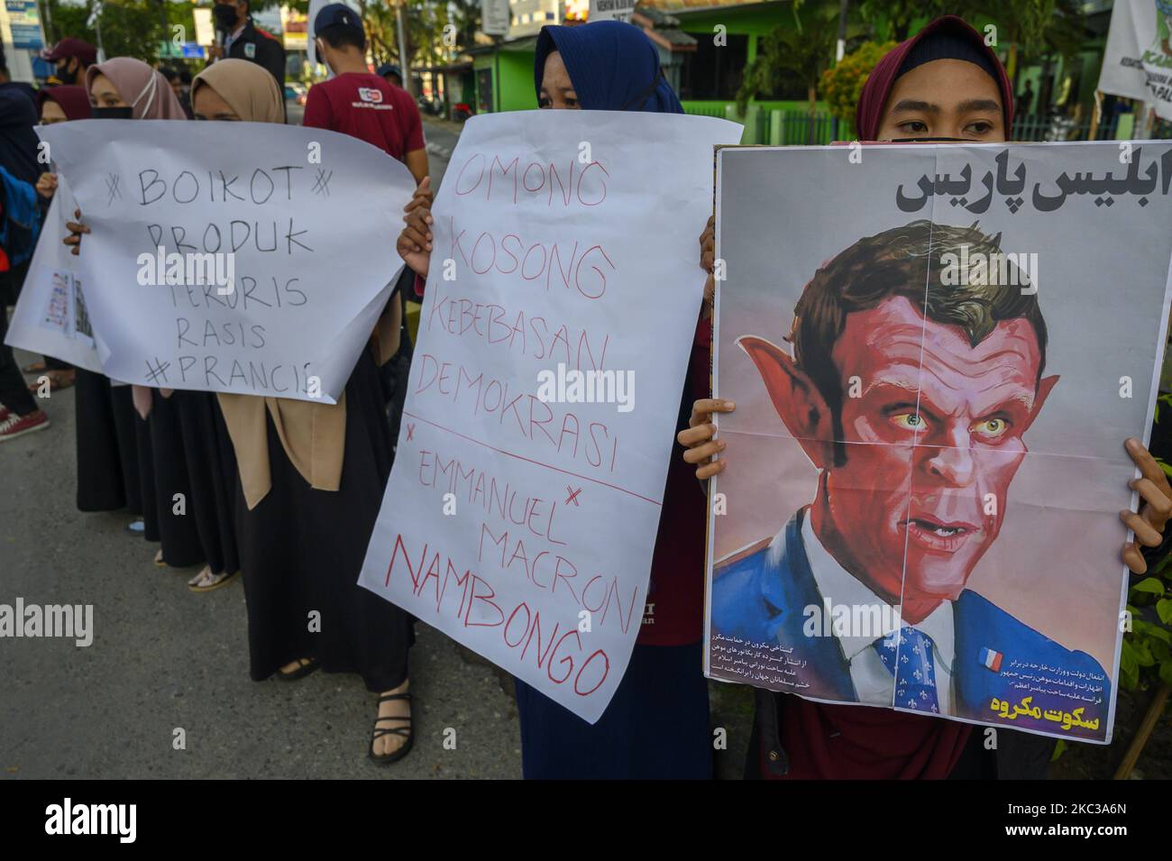 An activist from the Indonesia Muslim Student Action Unit (KAMMI) Palu ...