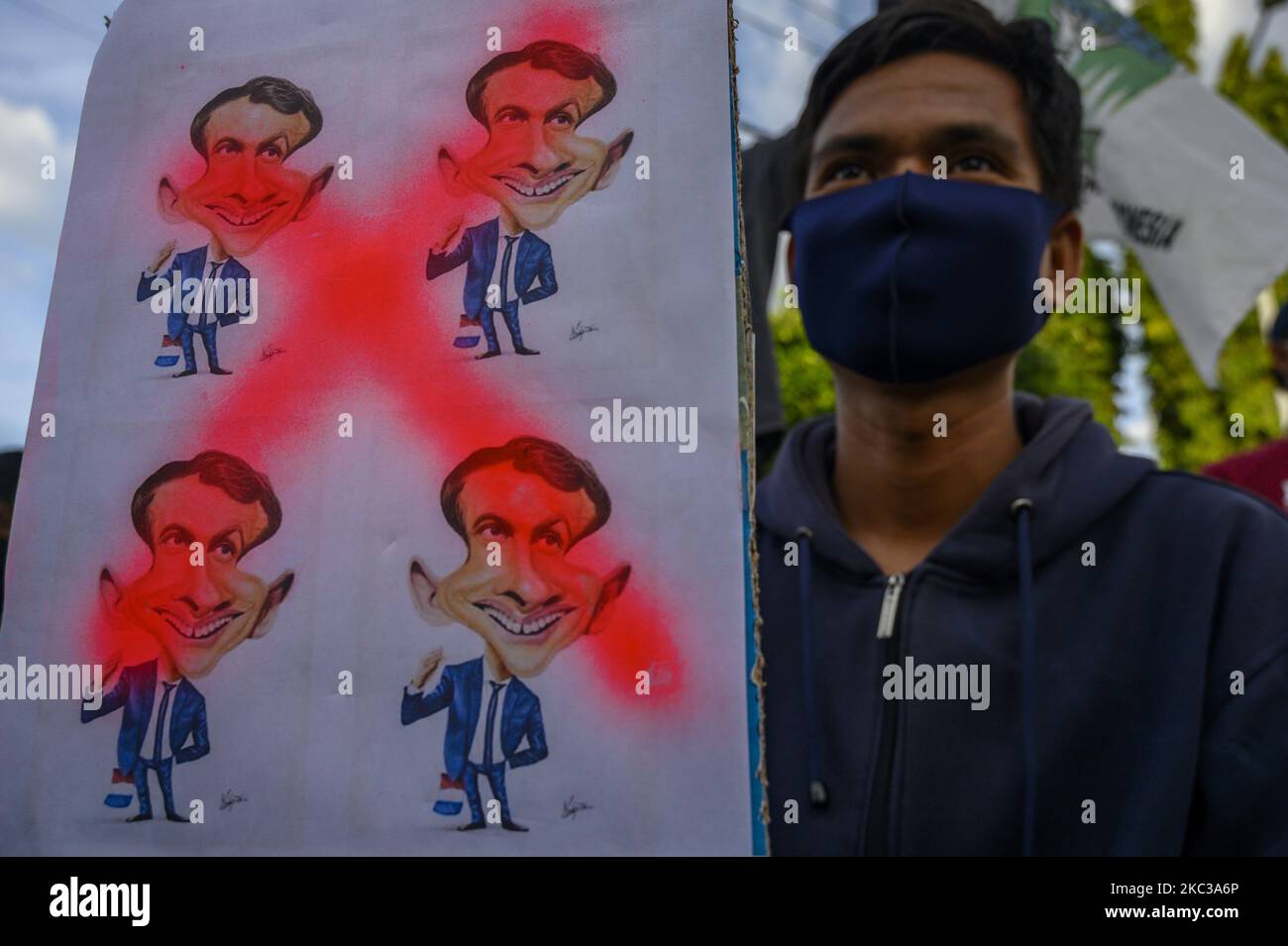 An activist from the Indonesia Muslim Student Action Unit (KAMMI) Palu ...