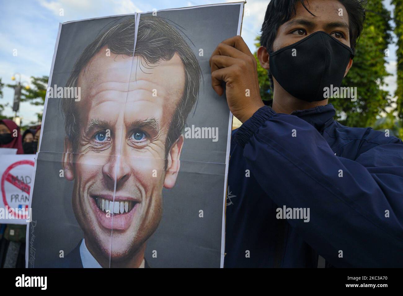 An activist from the Indonesia Muslim Student Action Unit (KAMMI) Palu ...