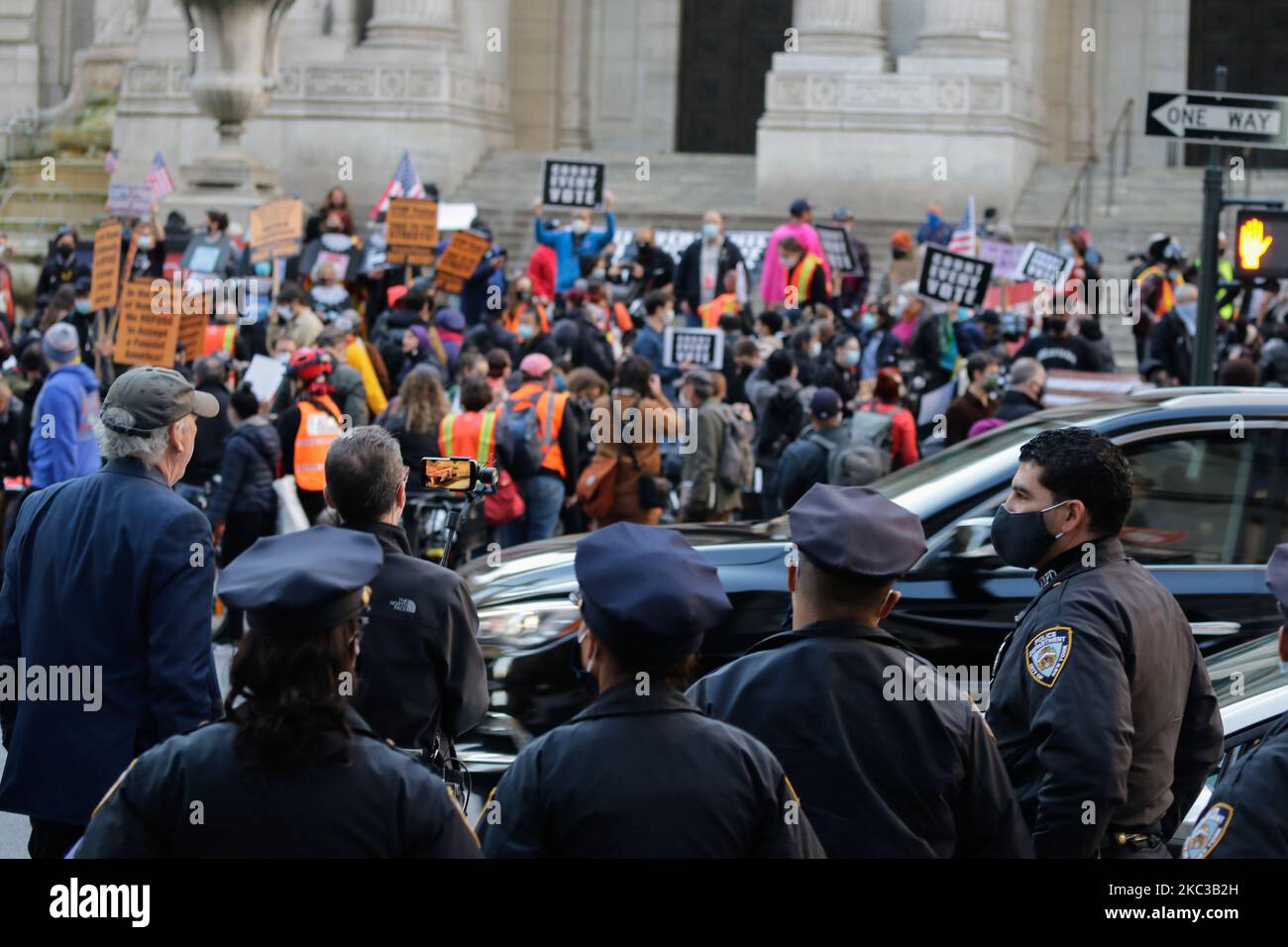 NYPD Officilas are seen on the other side of New York Public Library ...