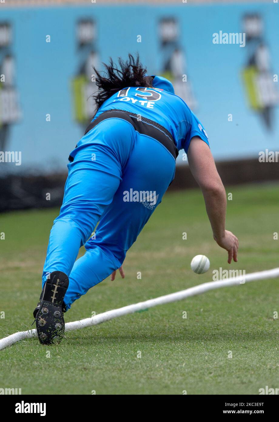 Sarah Coyte of the Strikers tries to catch and save boundary during the ...