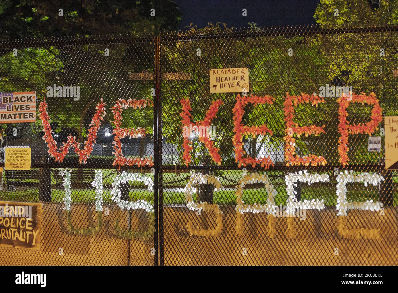 Messages of solidarity and hope were on display outside the White House ...