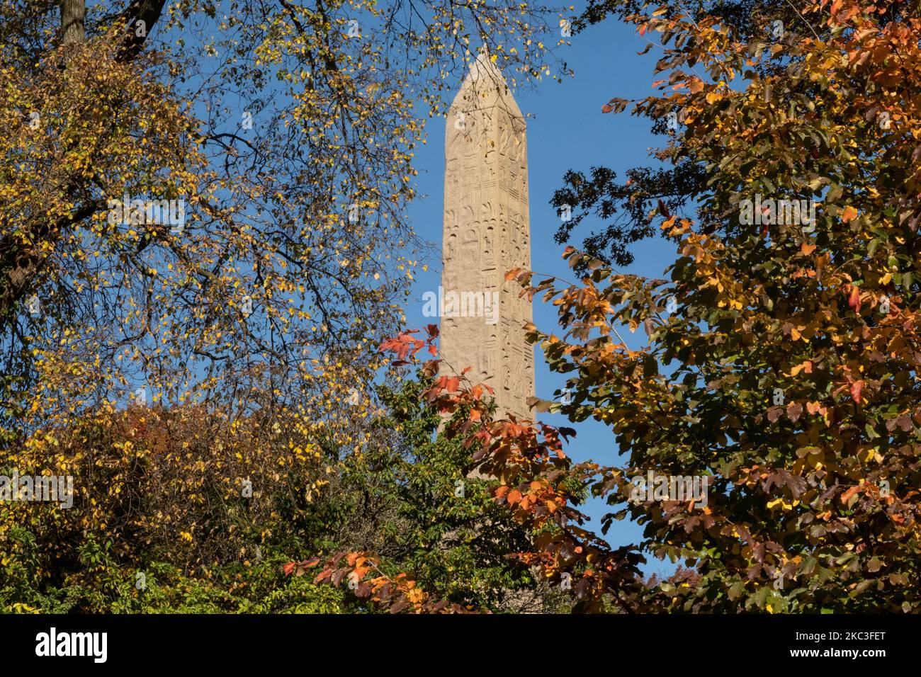Cleopatra's Needle Obelisk with fall foliage in Central Park, New York ...