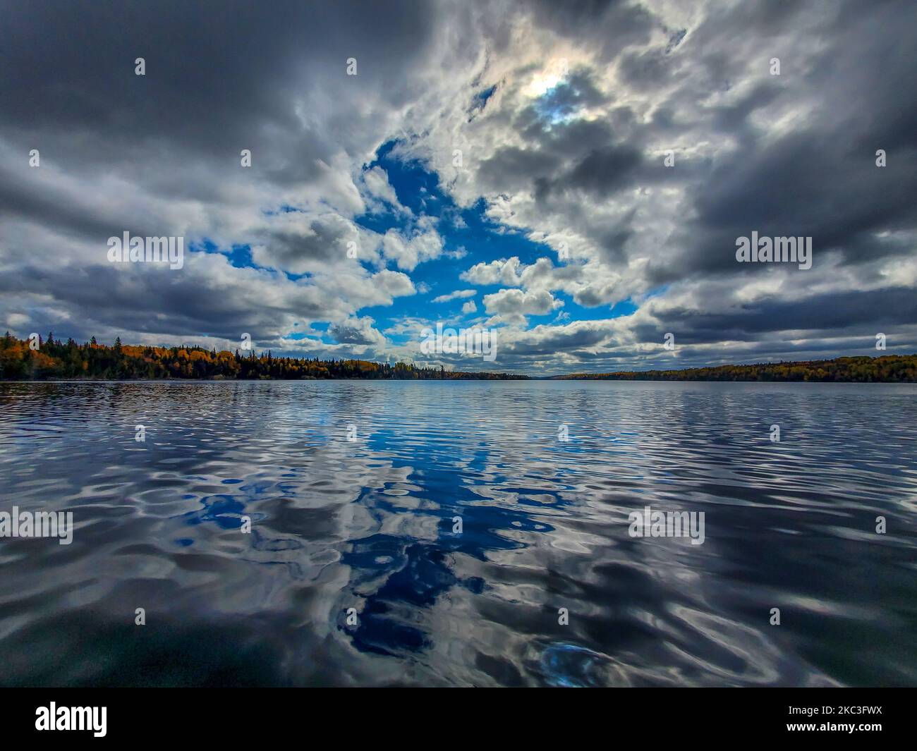 The beautiful reflection of clouds in a lake Stock Photo - Alamy