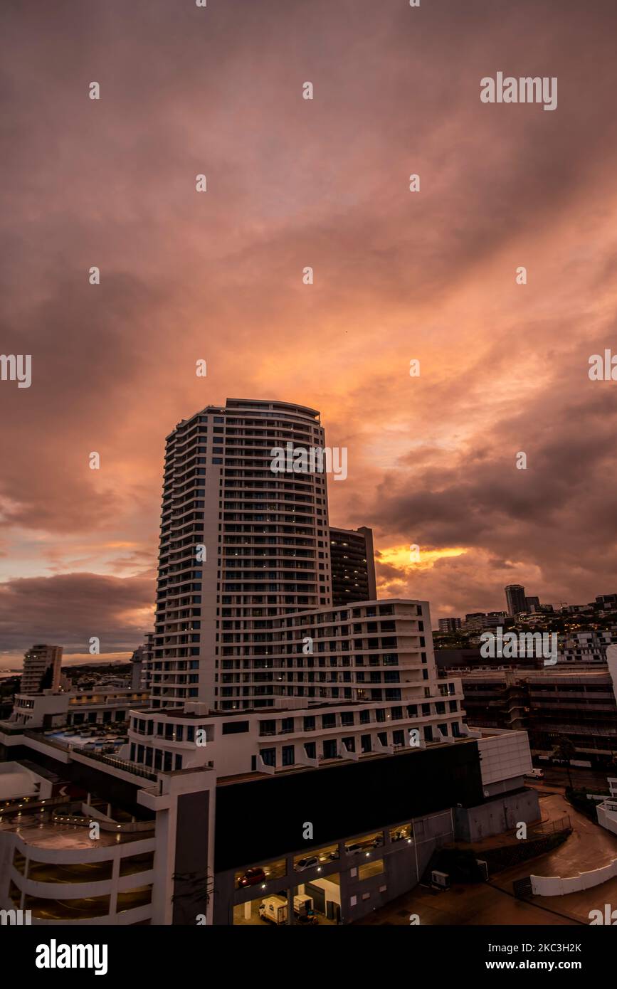A modern, skyscraper in the downtown at sunset, vertical Stock Photo ...
