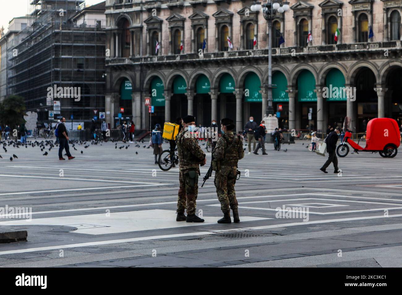 A police patrol in Piazza Duomo during the lockdown in Lombardy red ...