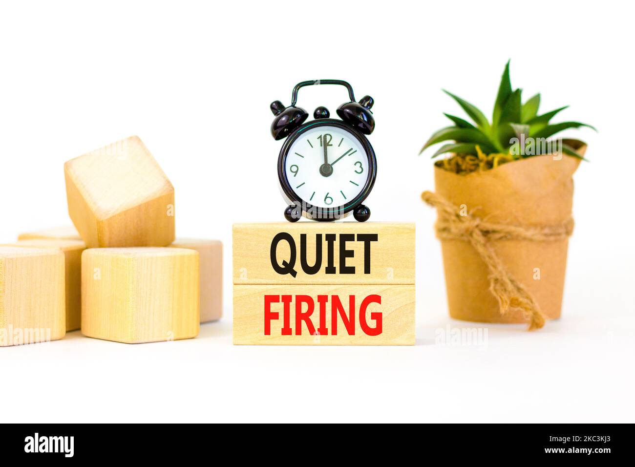 Quiet firing symbol. Concept words Quiet firing on wooden blocks ...