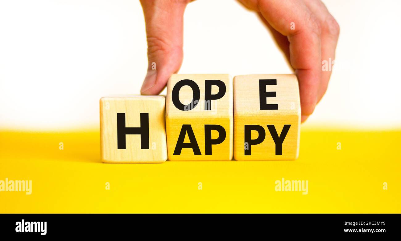 Hope and happy symbol. Concept words Hope and Happy on wooden cubes ...