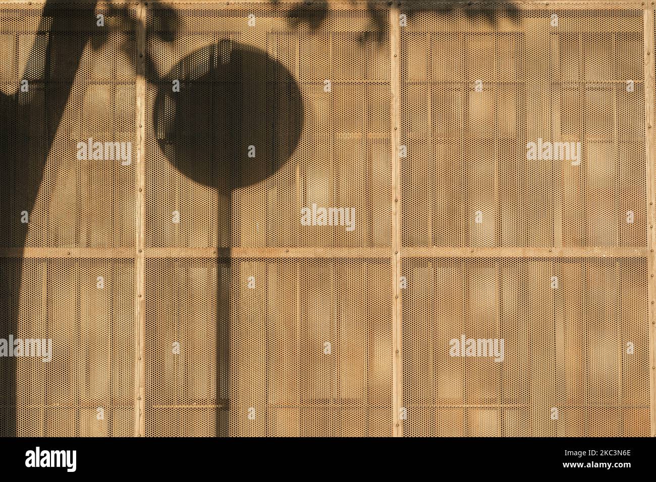 The view of a street sign shadow over a beige tent wall Stock Photo - Alamy