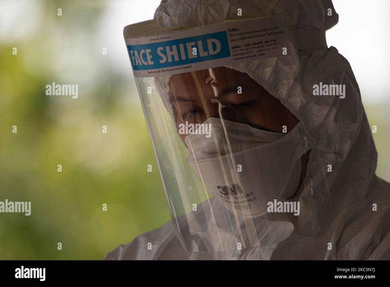 A health worker in personal protective equipment (PPE) at Ministry of ...