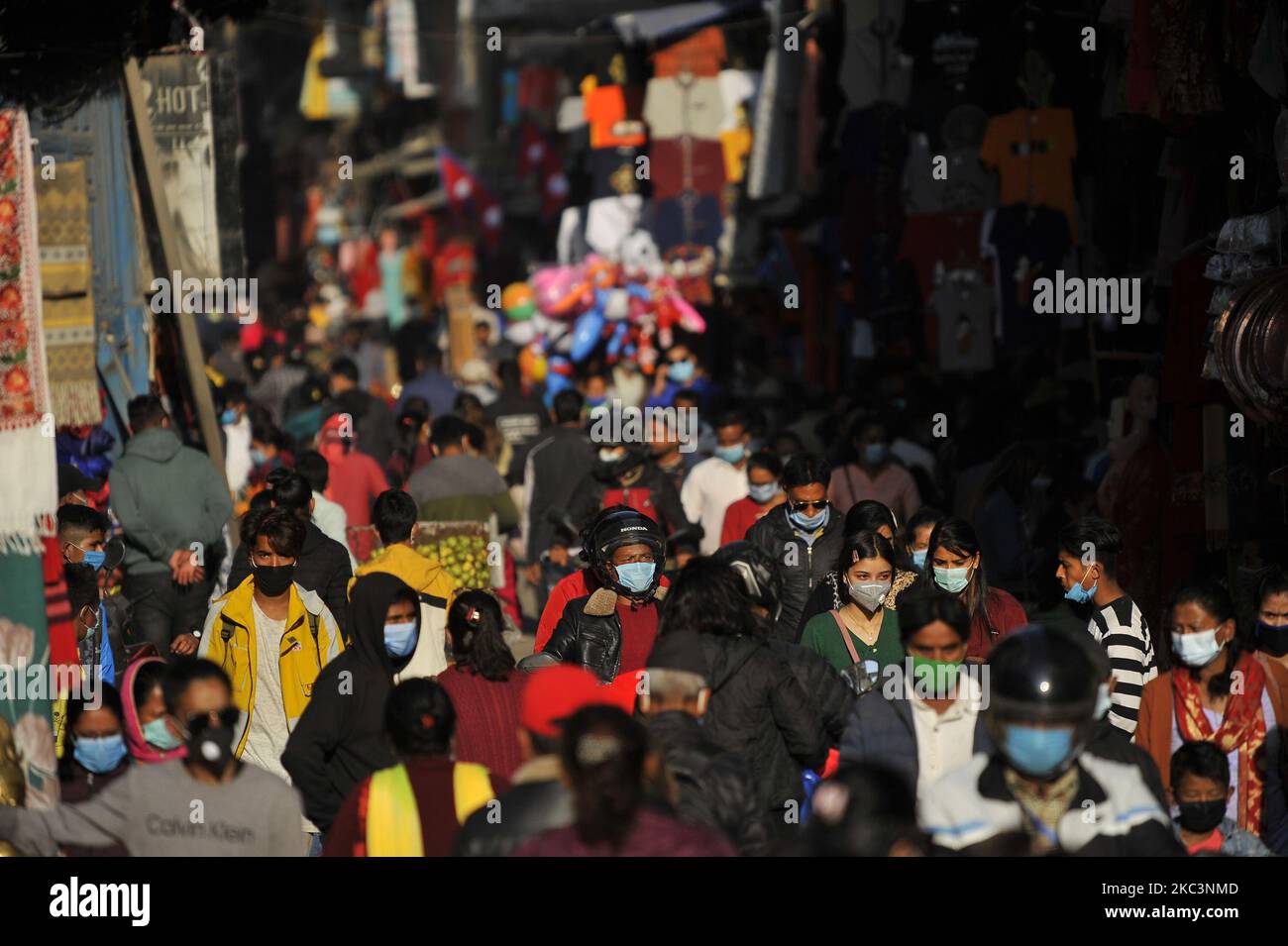 Nepalese people walking around the market for the Tihar festival ...