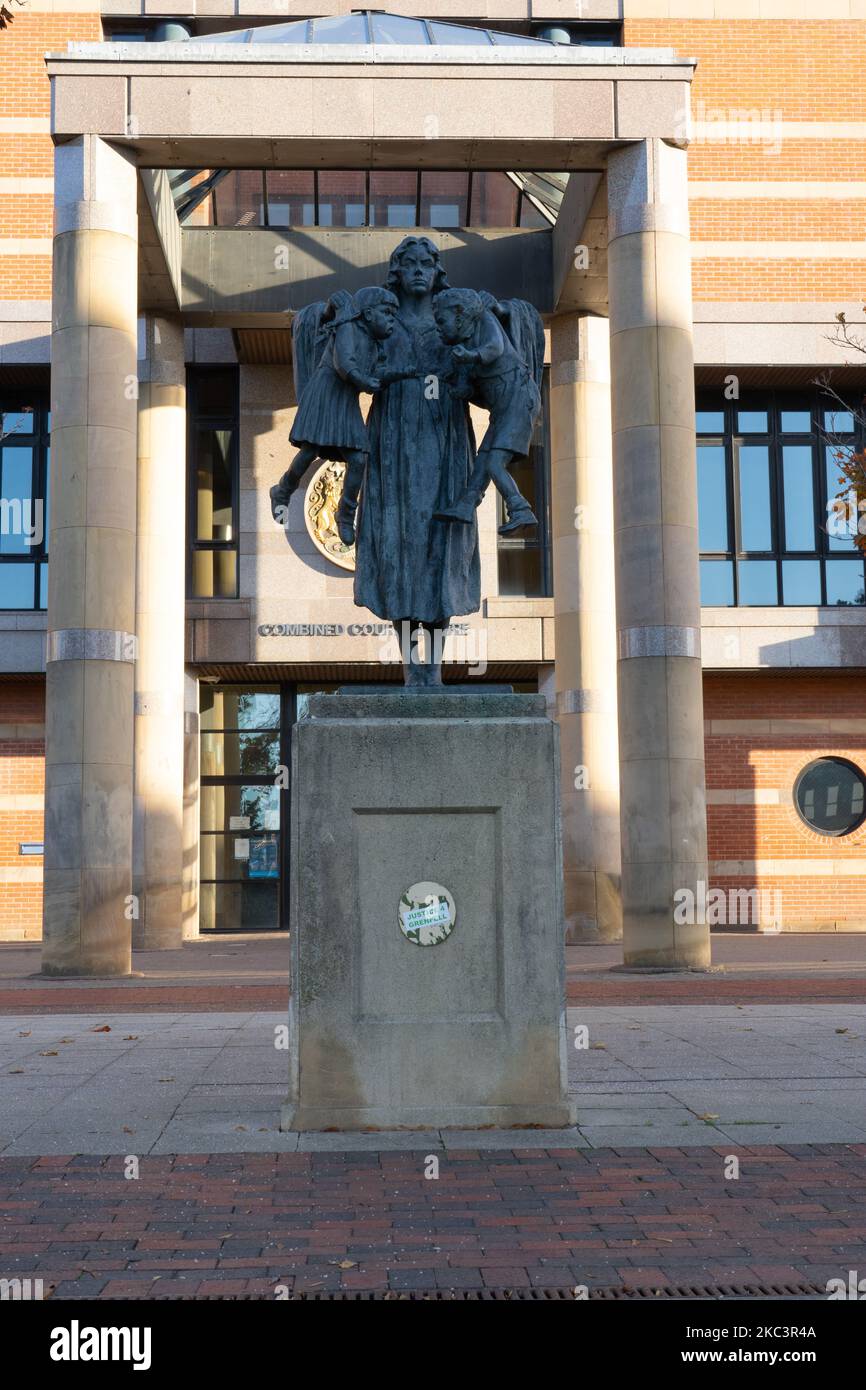 A vertical shot of crown court law center justice statue Stock Photo ...